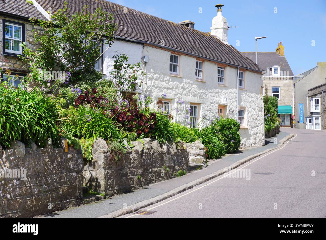 Pretty Hugh Town with its tidy streets and romantic cottages - St Mary ...