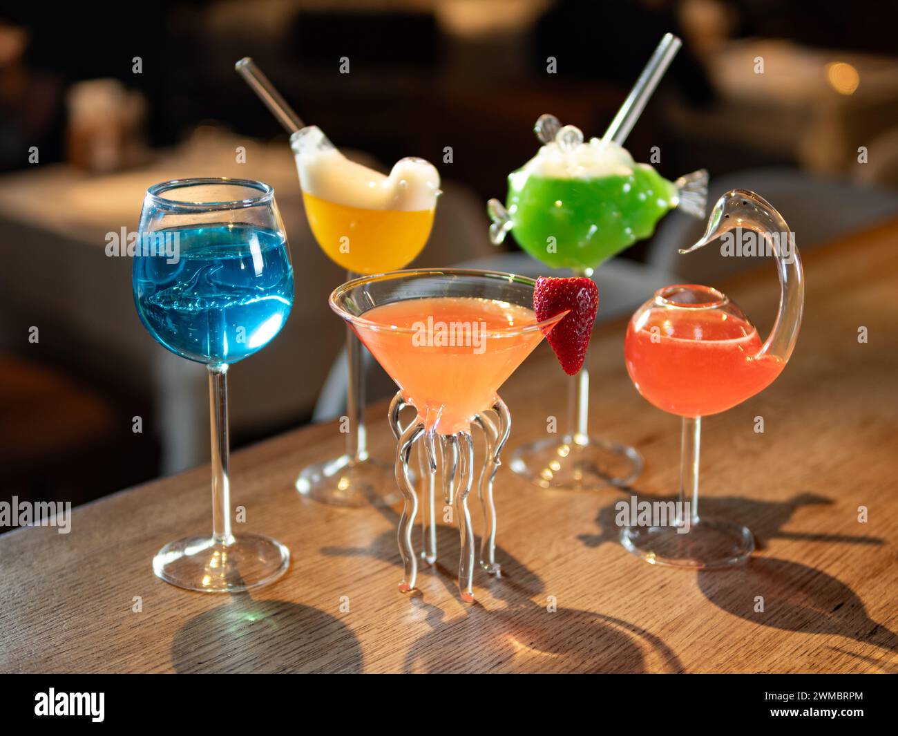 Set of different colorful alcoholic cocktails - margarita, blue lagoon ...