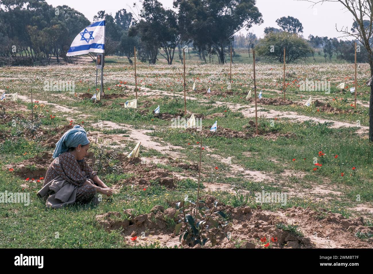 Kibbutz Reim, Israel. 25th Feb, 2024. Visitors join grieving families ...
