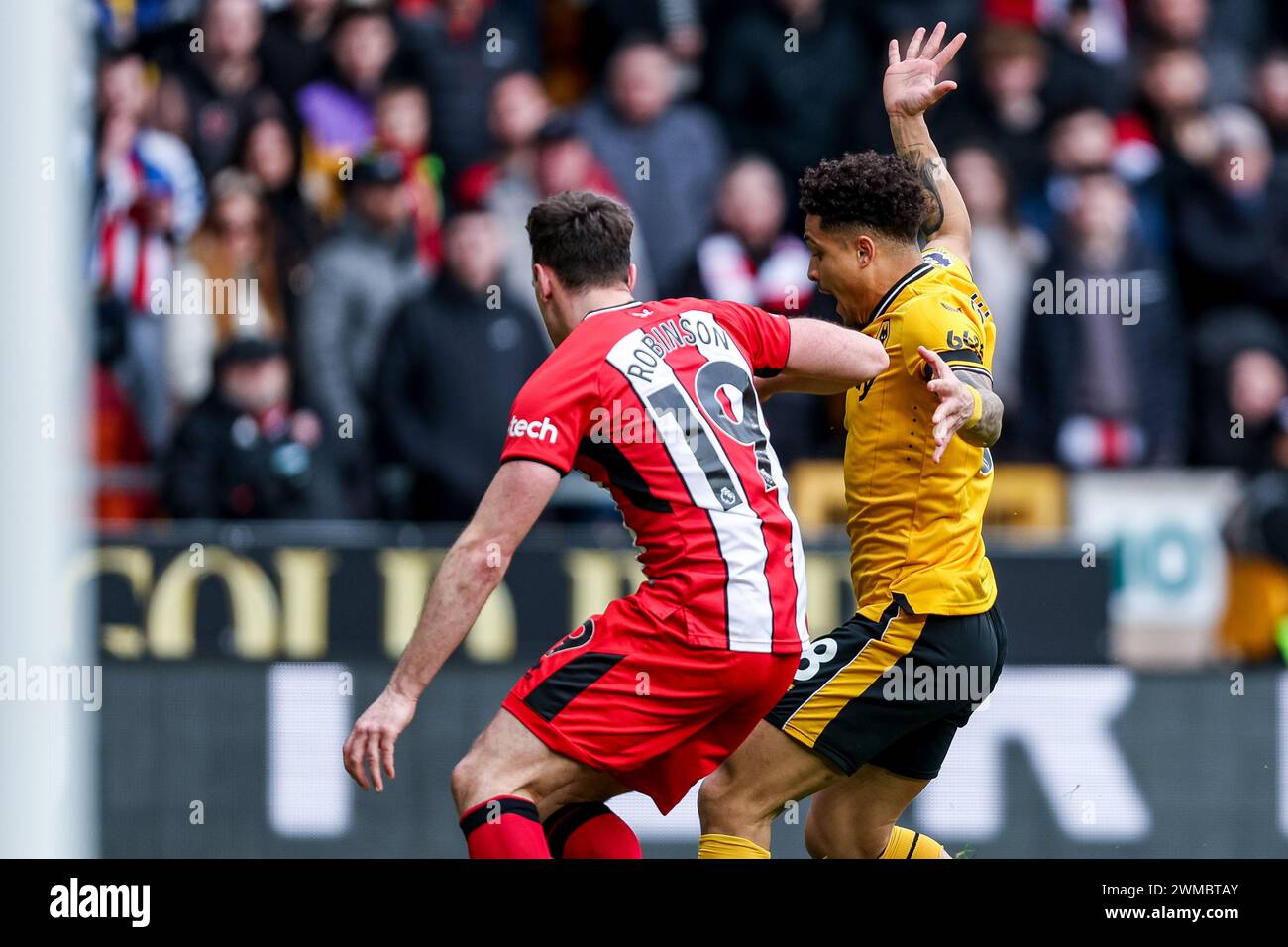Sheffield's Jack Robinson & Wolves' João Gomes battle for possession in ...