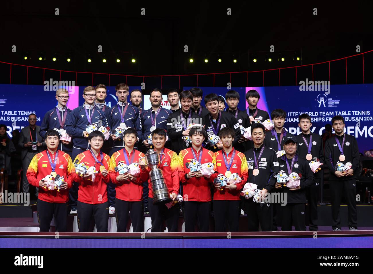 Busan, South Korea. 25th Feb, 2024. Gold medalists team China (front), silver medalists team ...