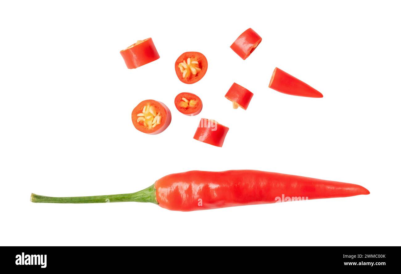 Top view of single fresh red chili pepper with slices is isolated on ...