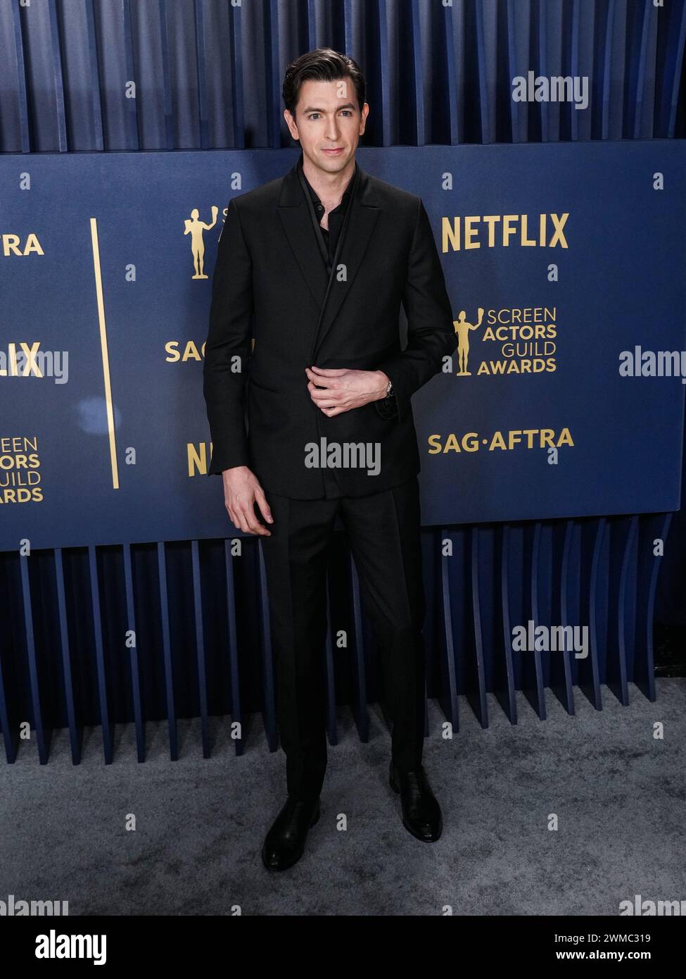 Los Angeles, USA. 24th Feb, 2024. Nicholas Braun walking on the red ...