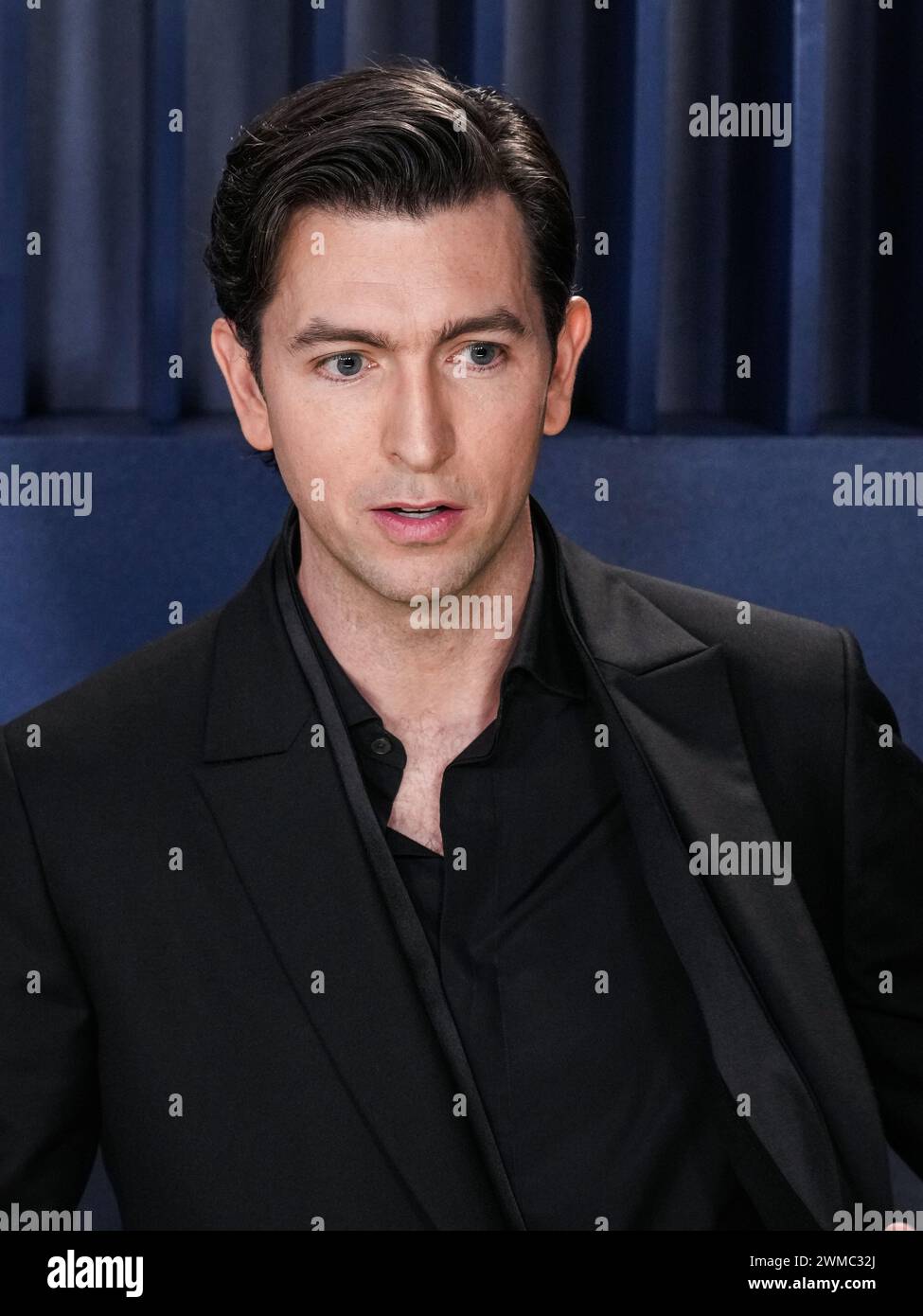 Los Angeles, USA. 24th Feb, 2024. Nicholas Braun walking on the red ...