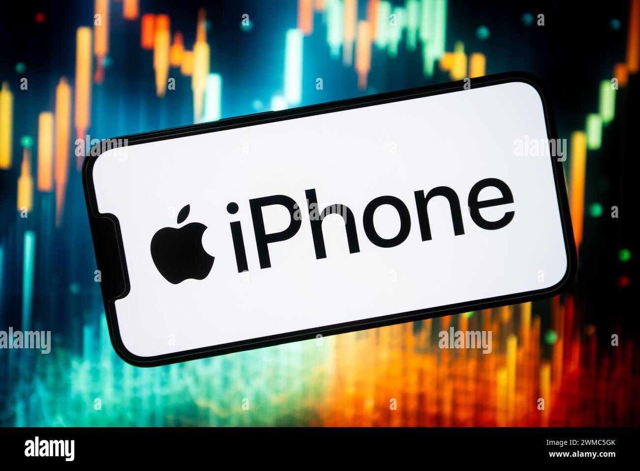 In this photo illustration, an iPhone logo seen displayed on a ...