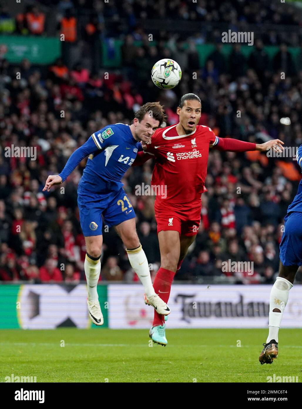 Liverpool's Virgil van Dijk (right) scores a header only to see the ...