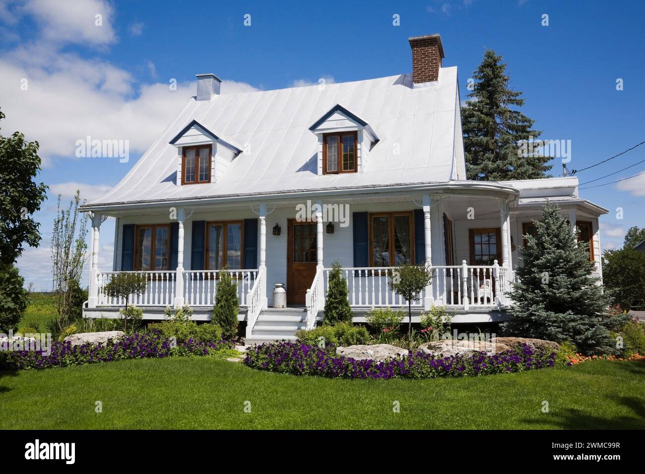 Old 1821 white with blue trim Canadiana style home with long veranda ...