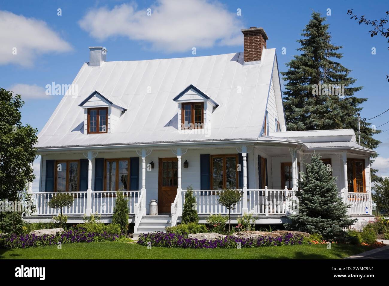 Old 1821 white with blue trim Canadiana style home with long veranda ...