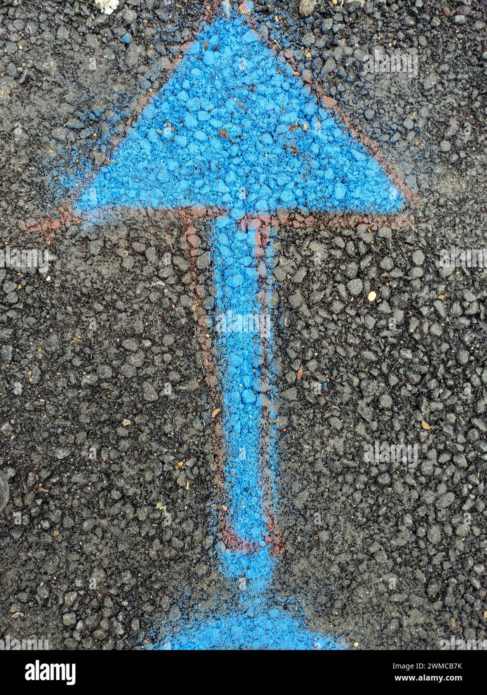 Road paint marking blue arrow hi-res stock photography and images - Alamy