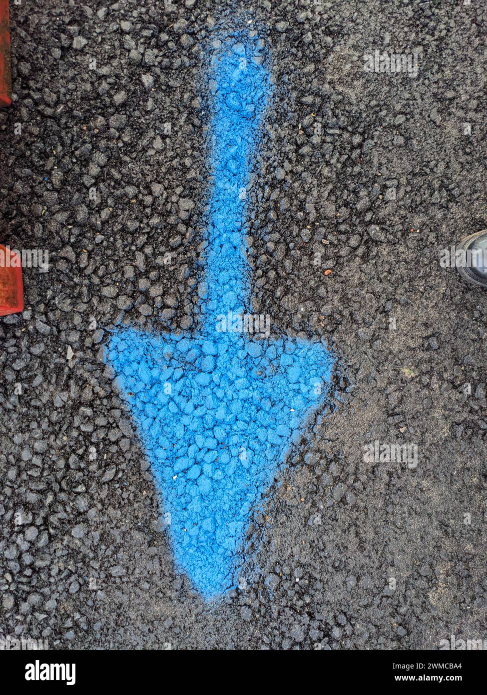 Road paint marking blue arrow hi-res stock photography and images - Alamy
