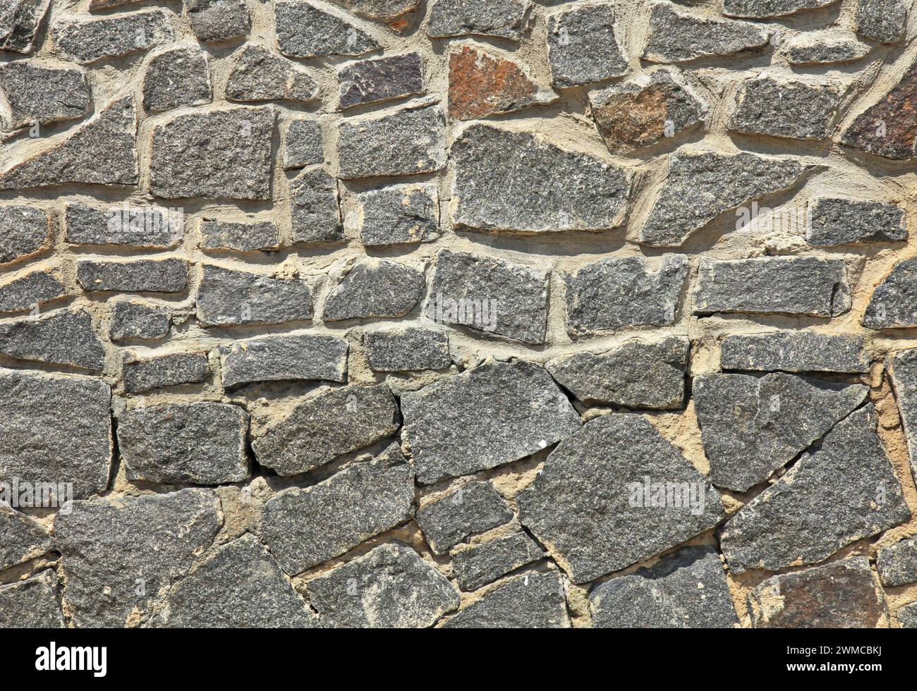 Granite wall, background. Surface of stone structure built of granite ...