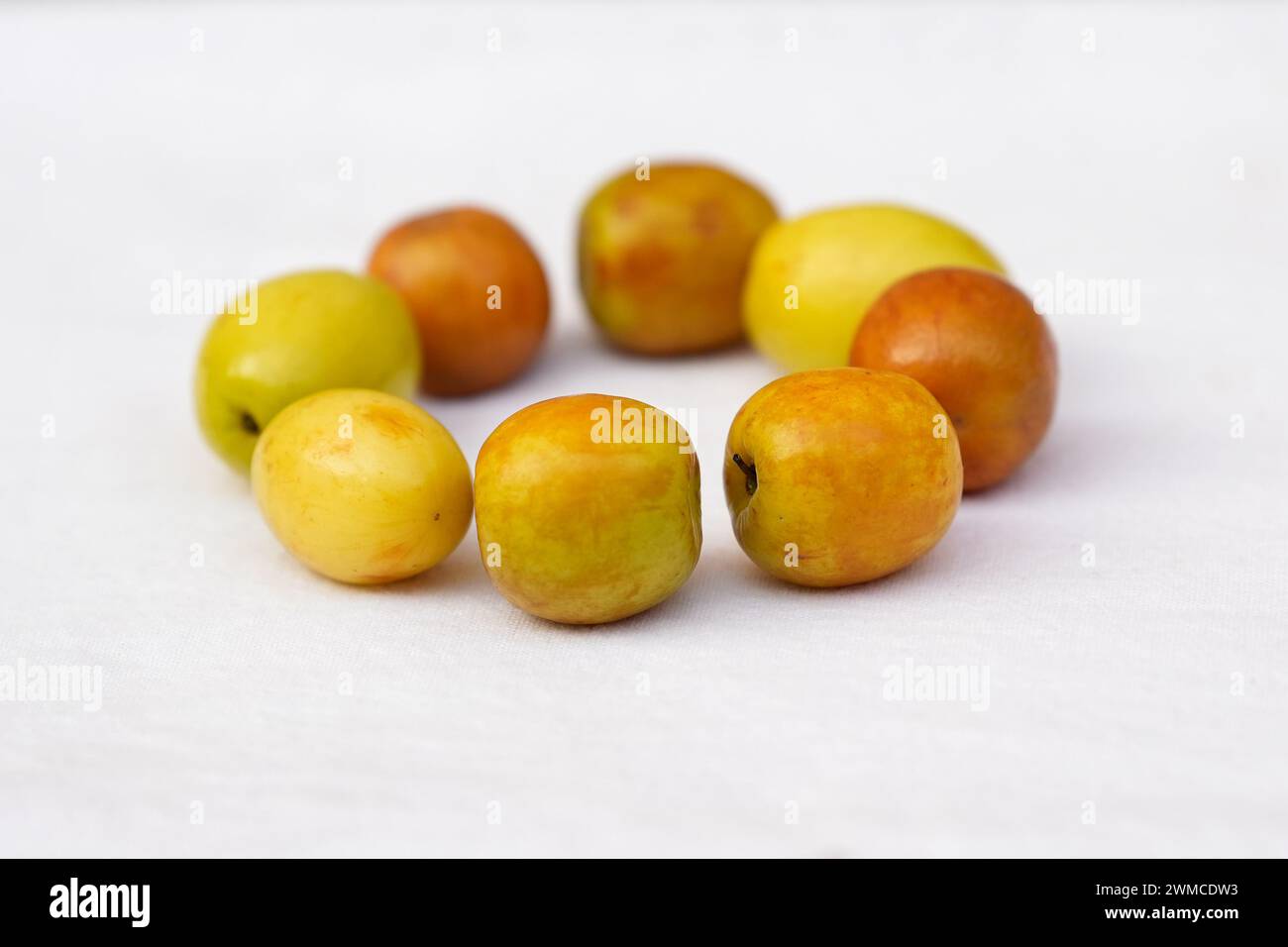 Top side view of Bair or Jujube fruit decorated in round shape isolated ...