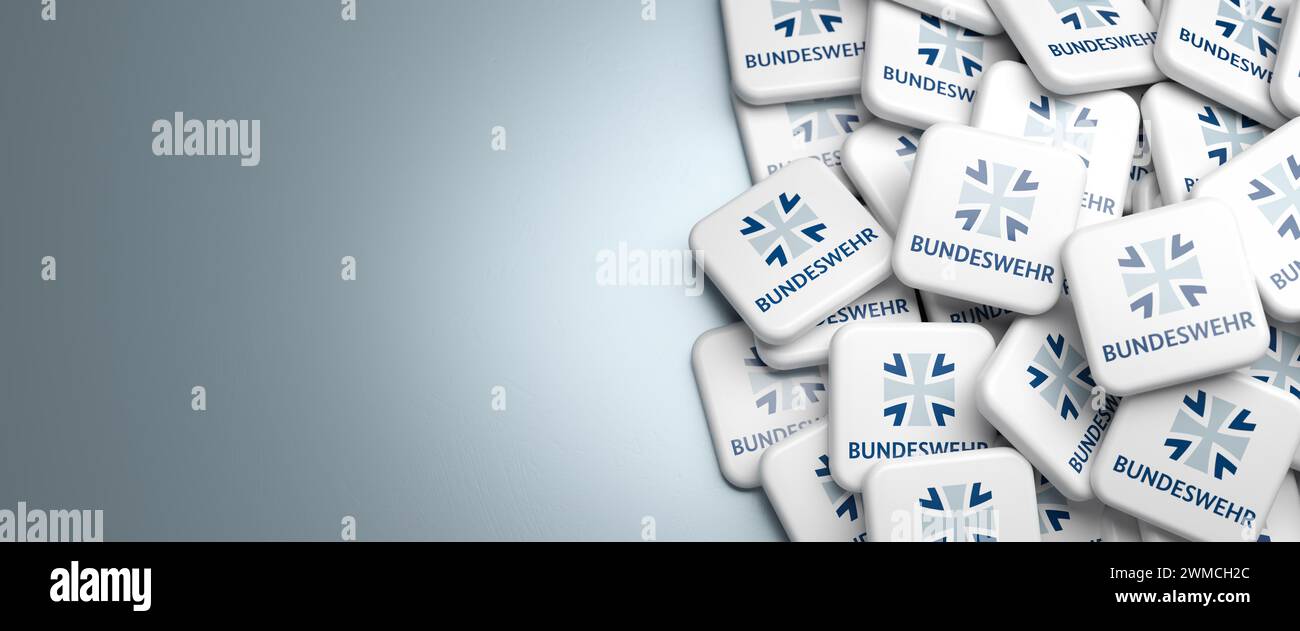 Logo of the German Bundeswehr (armed forces) on a heap on a table. Web ...