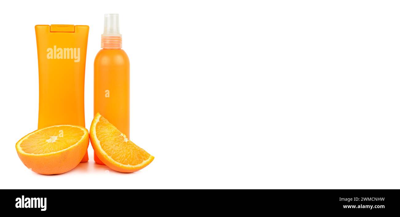 Orange natural cosmetic products: Suntan oil and lotion. Vials isolated ...