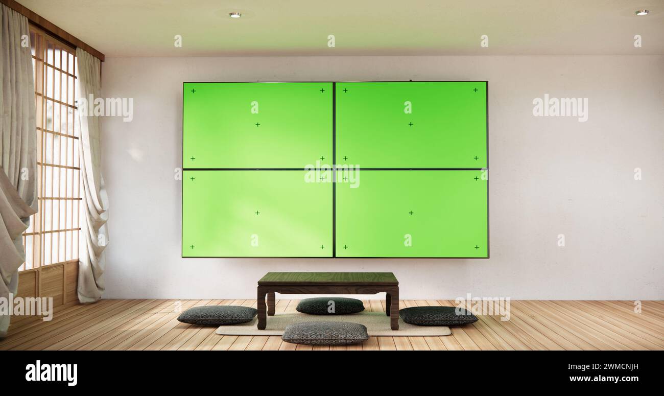 Smart Tv Mockup with blank green screen hanging in modern white empty ...
