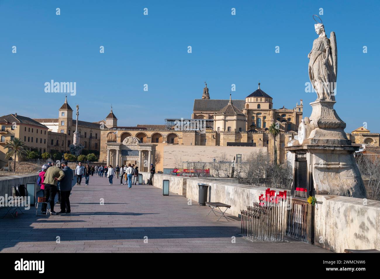In the foreground stands a statue of the 16th century San Rafael Gomez ...