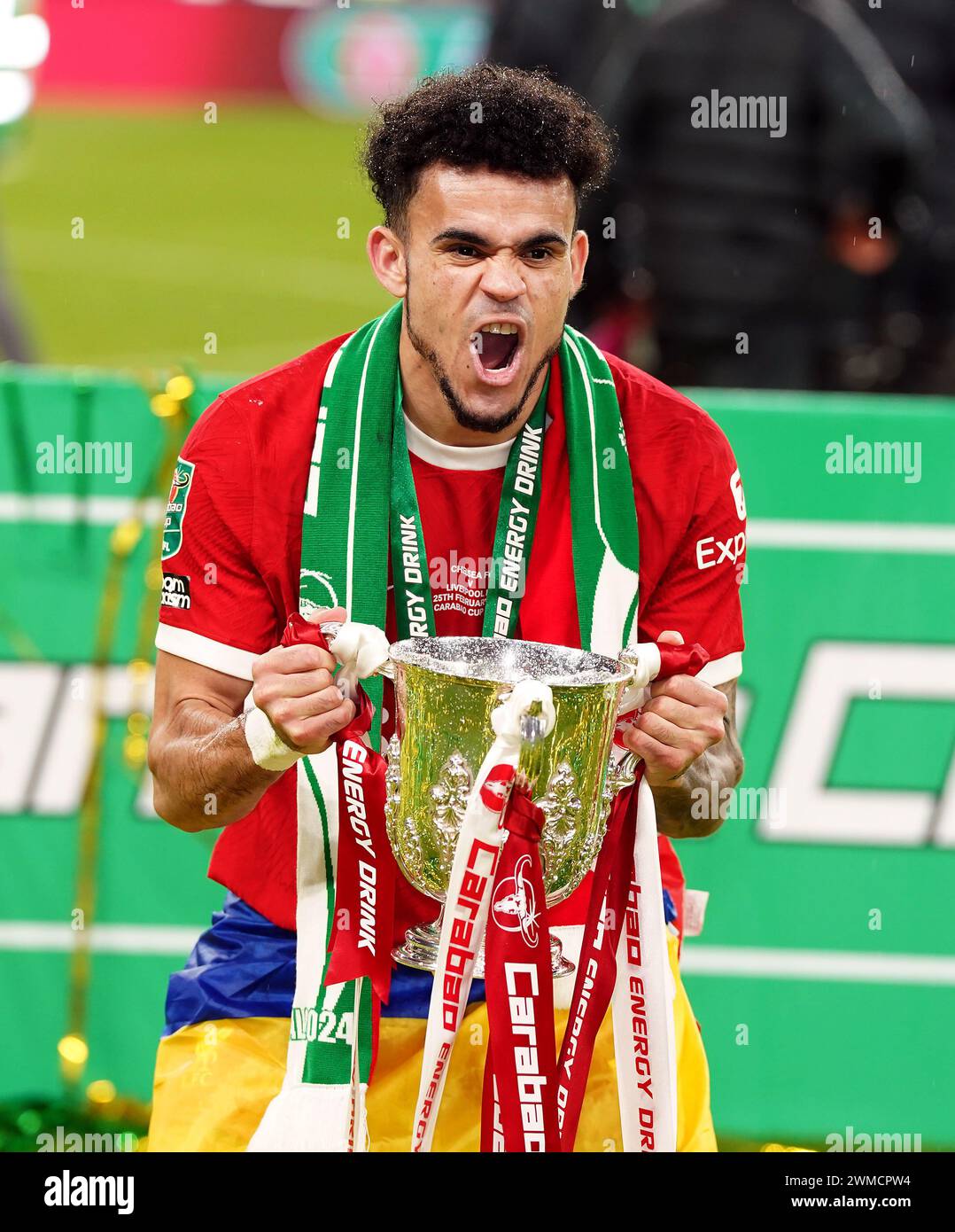 Liverpool's Luis Diaz with the trophy after winning the Carabao Cup ...