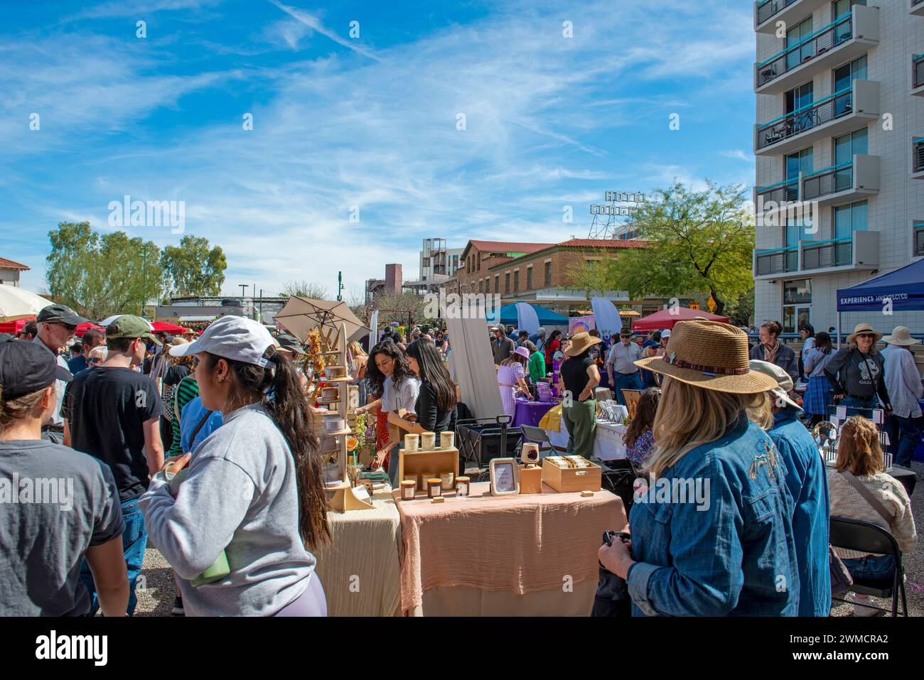 People at the homemade crafts market on 5th street in downtown Tucson ...