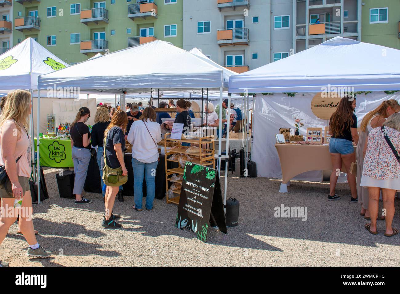 People at the homemade crafts market on 5th street in downtown Tucson ...