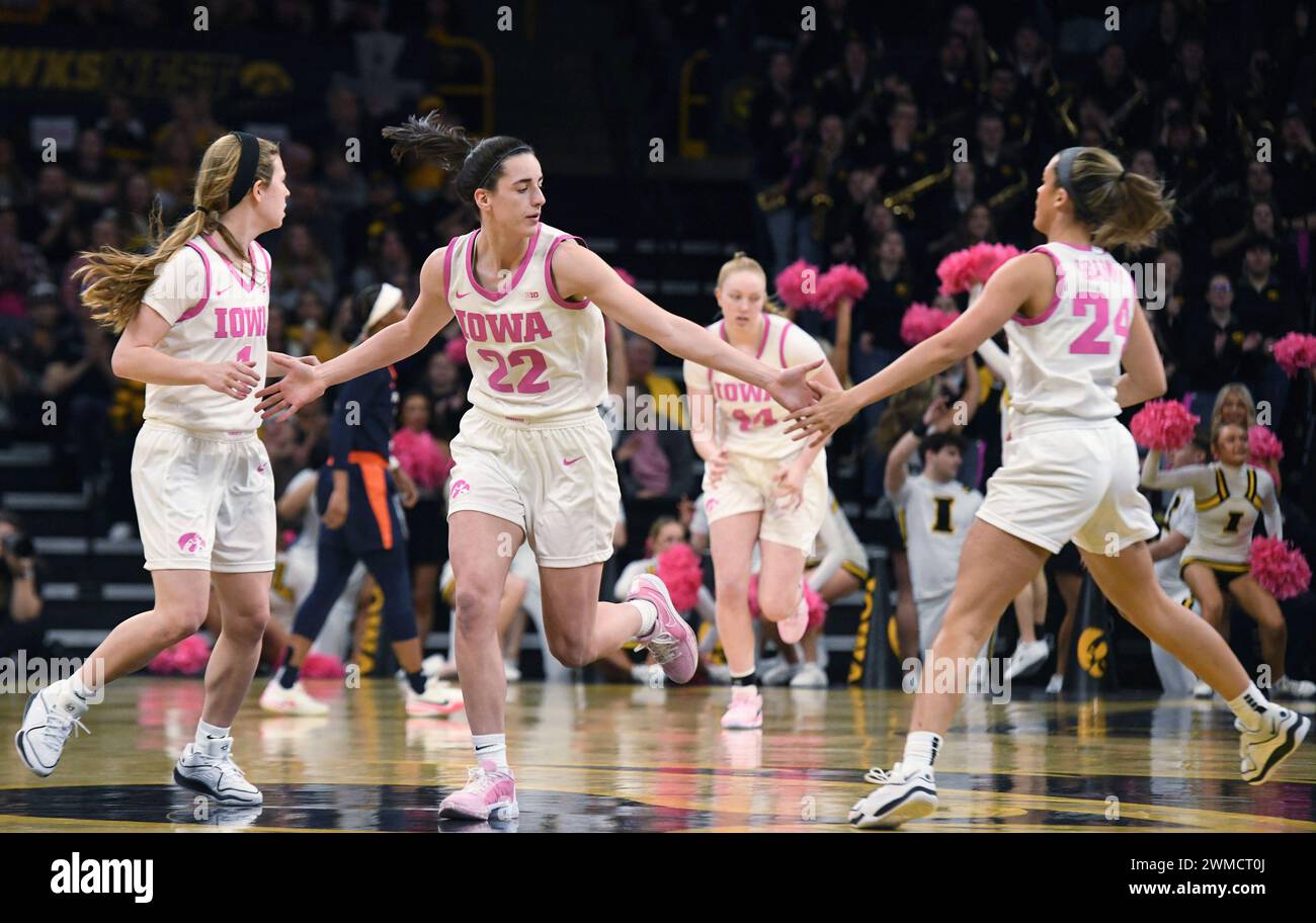 Iowa guard Caitlin Clark (22) celebrates a three point basket with Iowa ...
