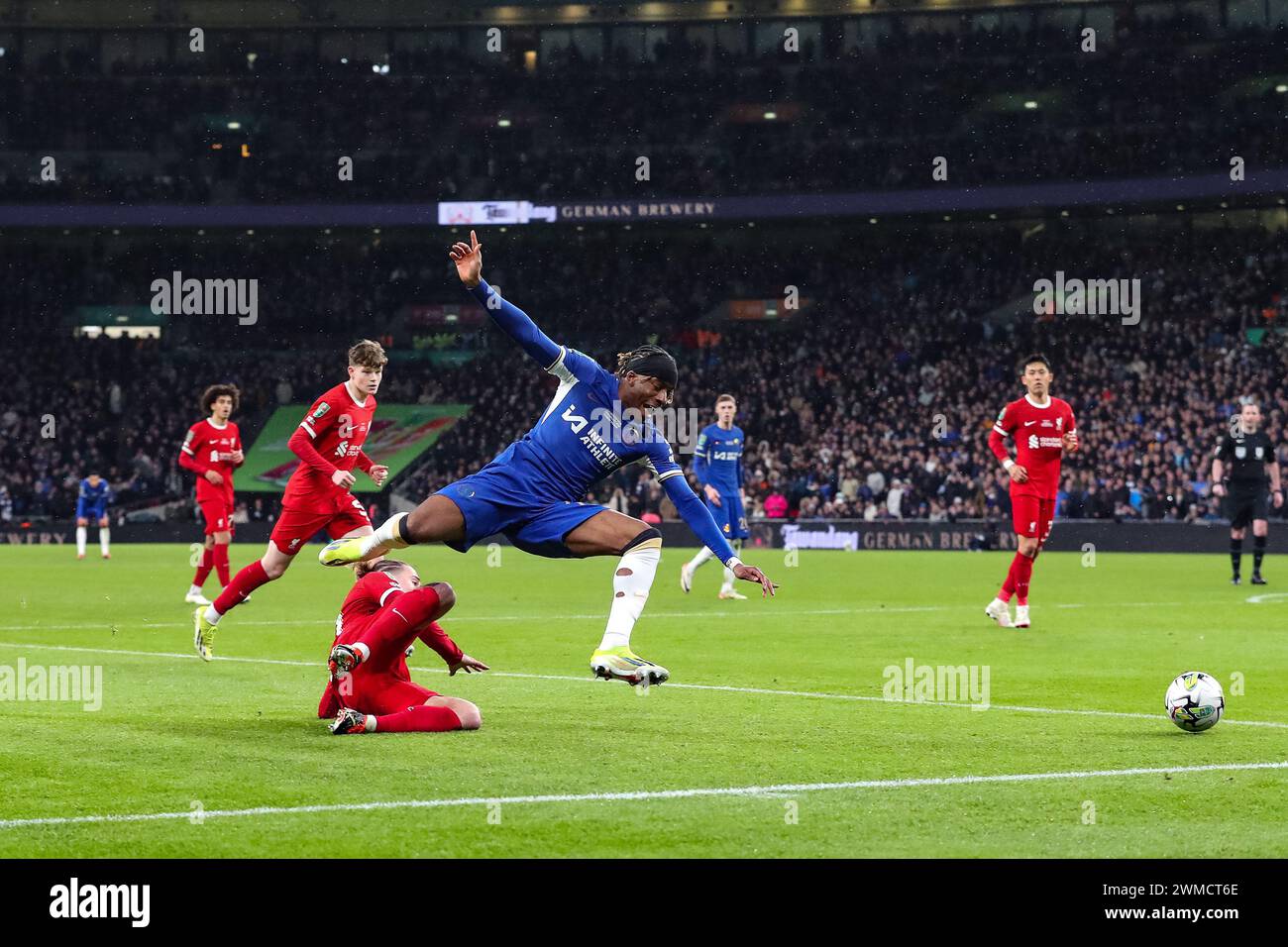 London, UK. 25th Feb, 2024. Kostas Tsimikas of Liverpool tackles Noni ...