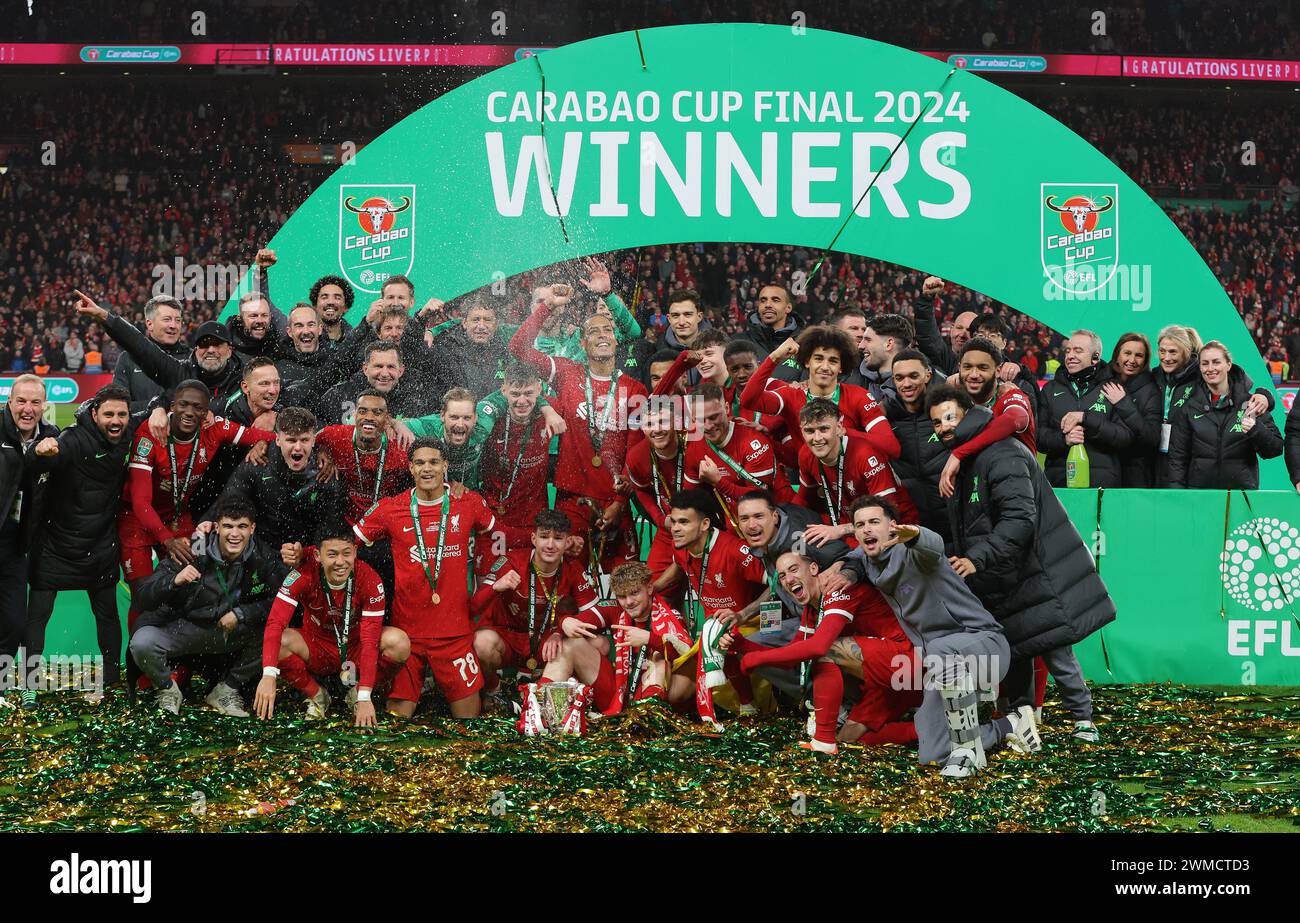 London, UK. 25th Feb, 2024. The Liverpool team celebrate after winning ...