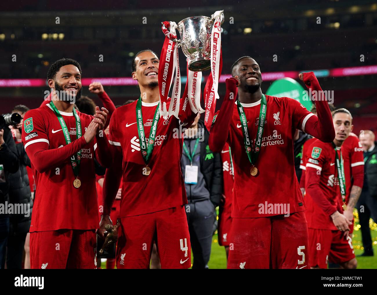 Liverpool's Virgil van Dijk with the trophy after winning the Carabao ...