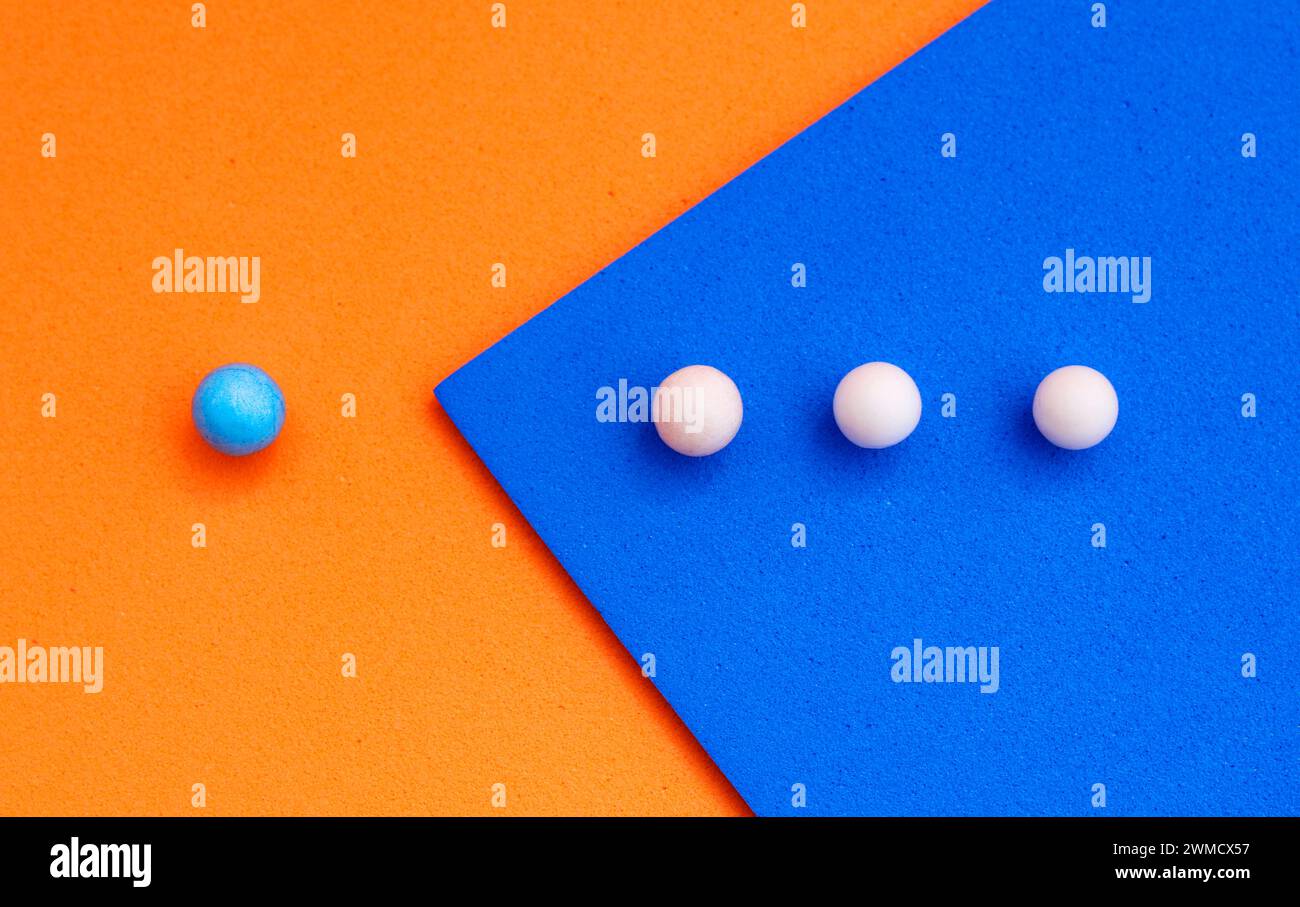 Spheres aligned over areas of different color Stock Photo - Alamy