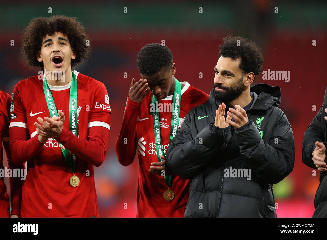 London, UK. 25th Feb, 2024. Jayden Danns (L) and Mohamed Salah (L) are ...