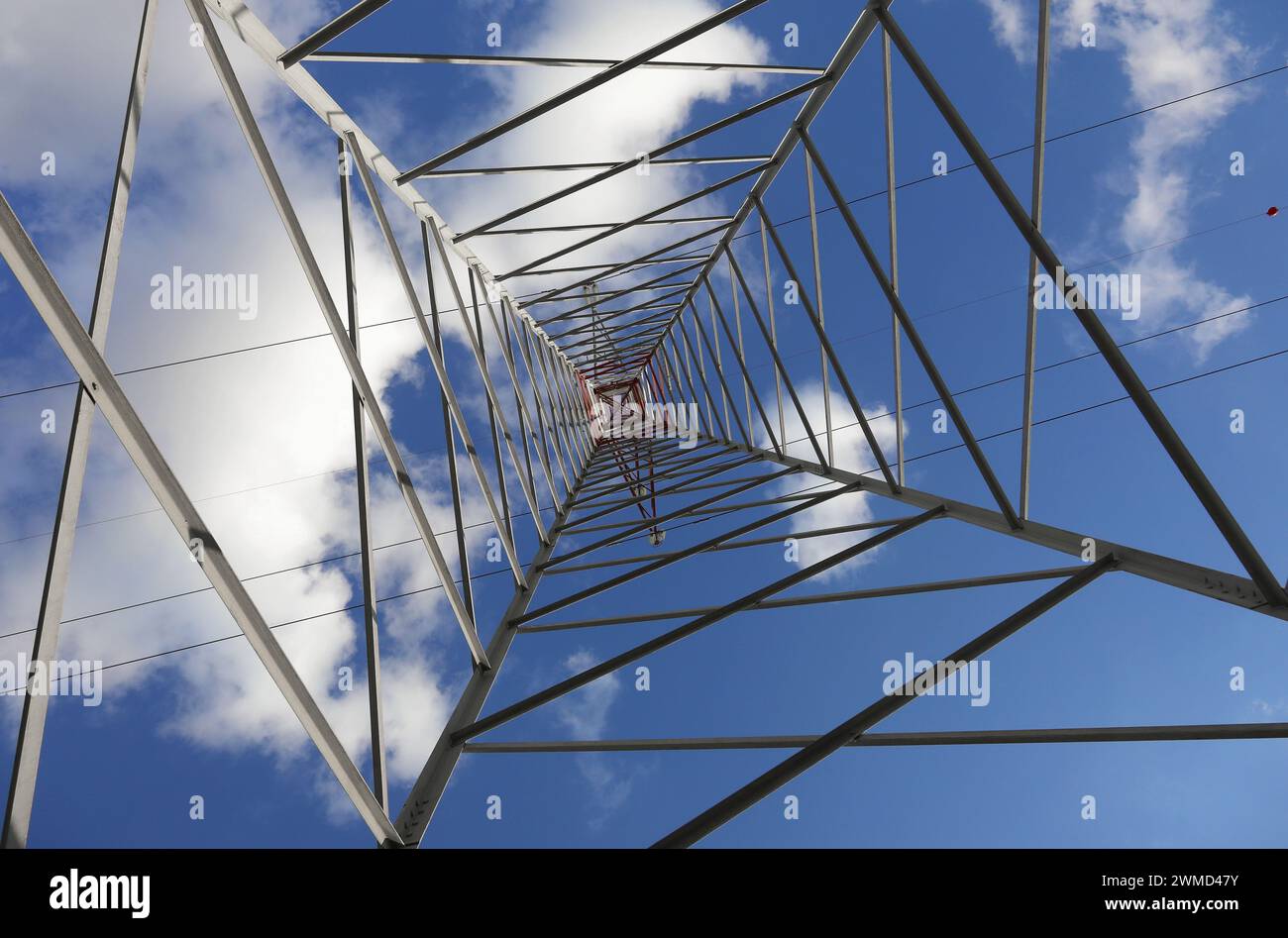 High Voltage Electricity Grid Pylon seen from below Stock Photo - Alamy