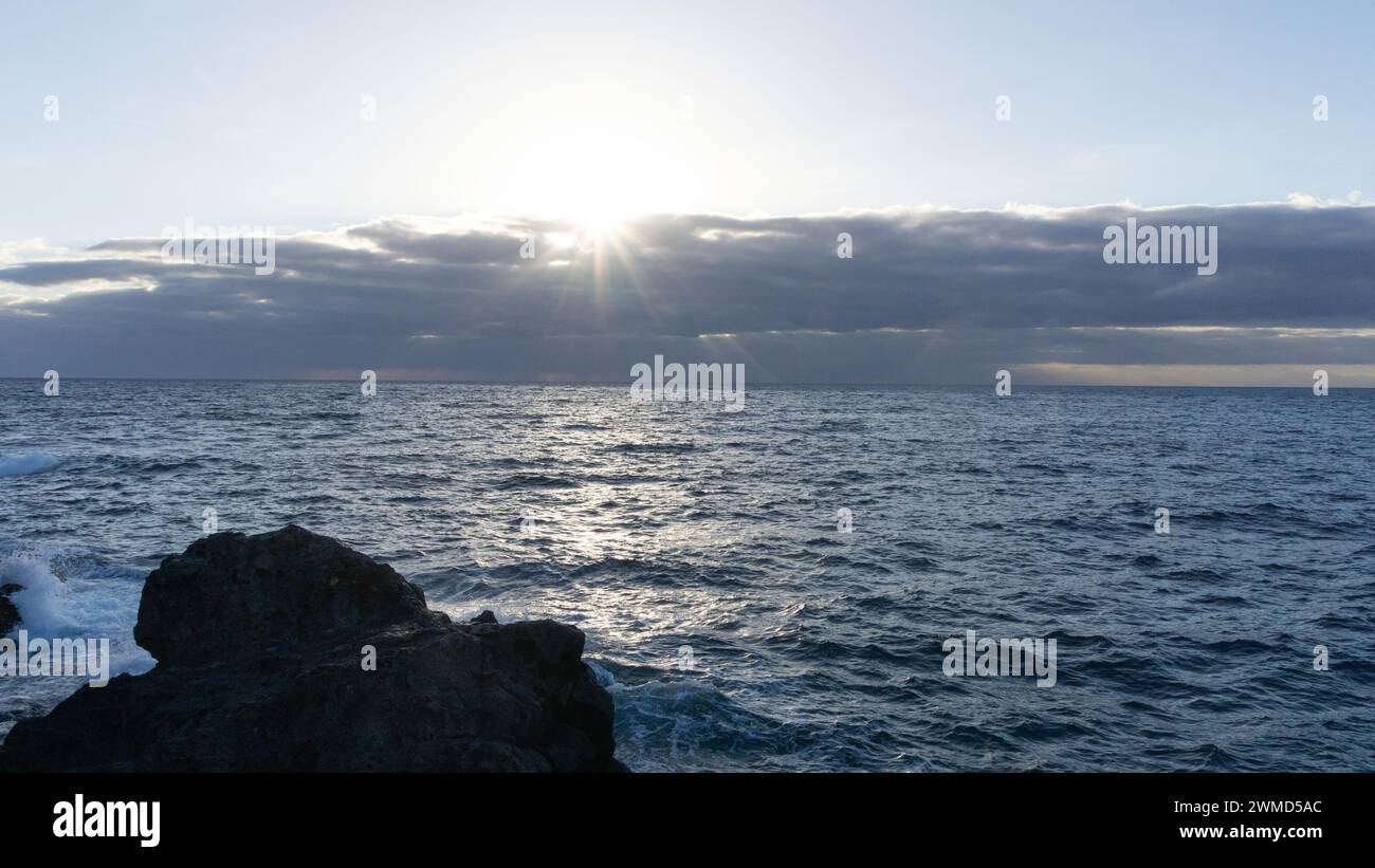 Breathtaking ocean sunset, tranquil beauty captured Stock Photo - Alamy