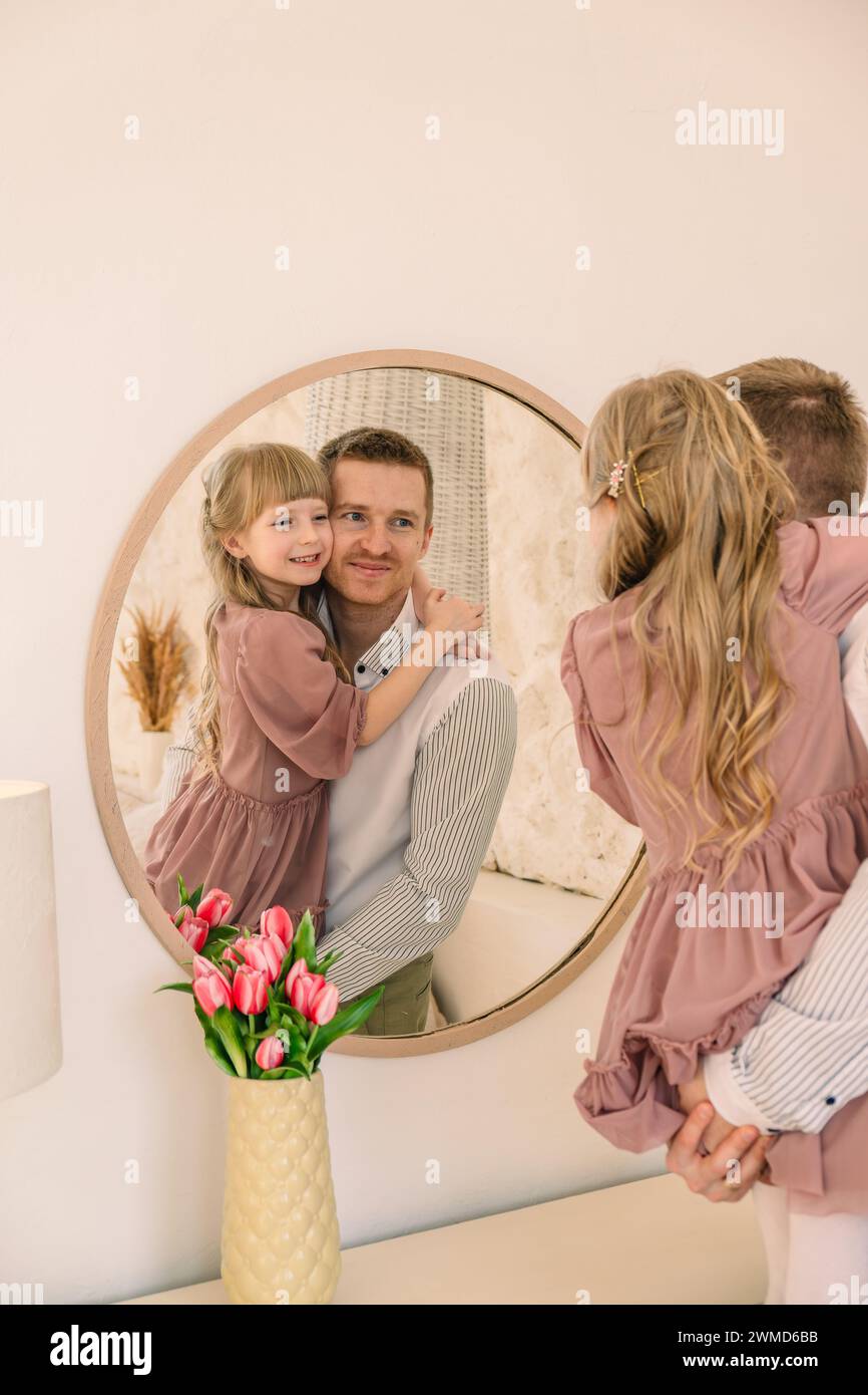 happy father with daughter reflection in the mirror Stock Photo - Alamy