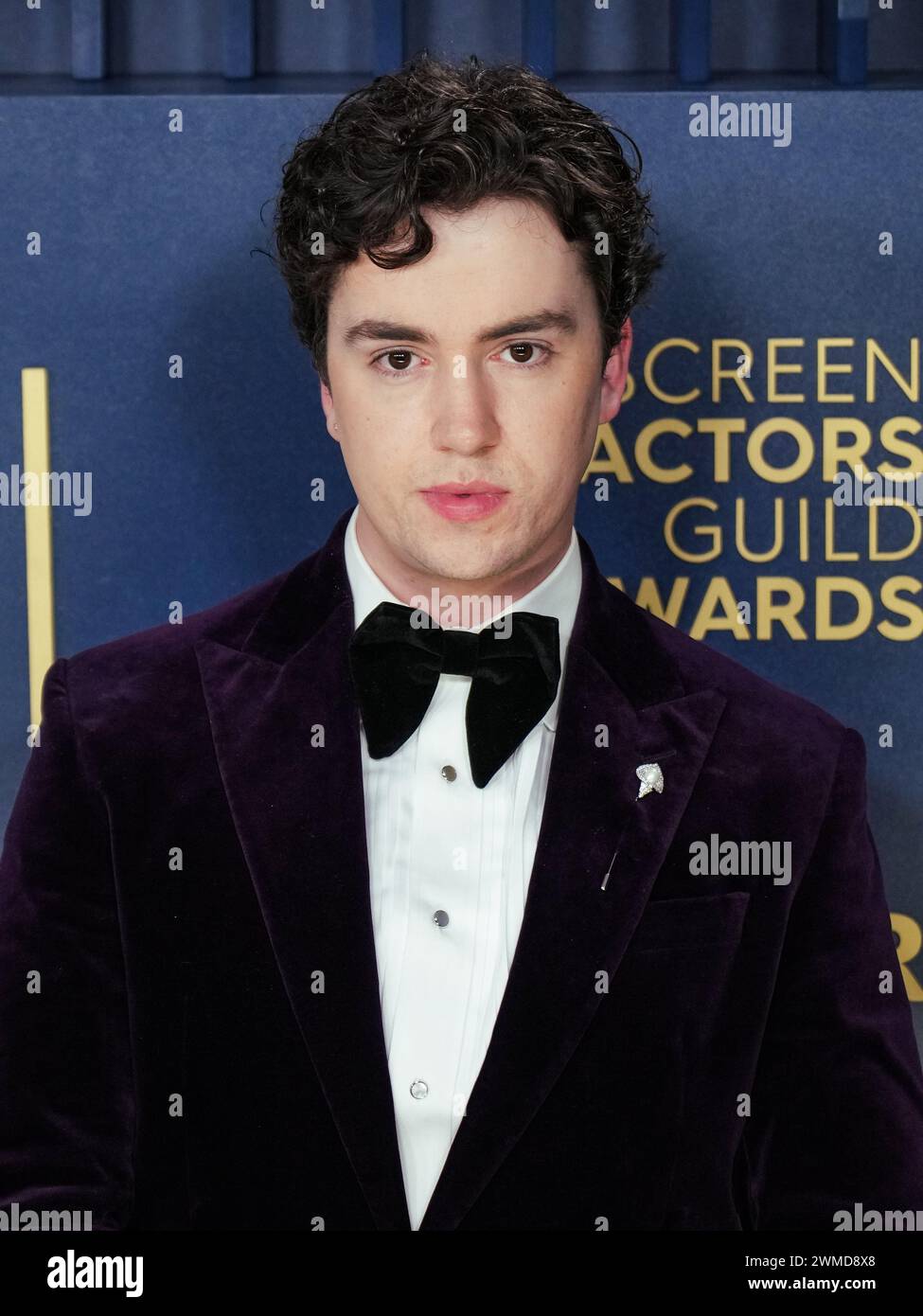 Los Angeles, USA. 24th Feb, 2024. Charlie Hiscock walking on the red ...