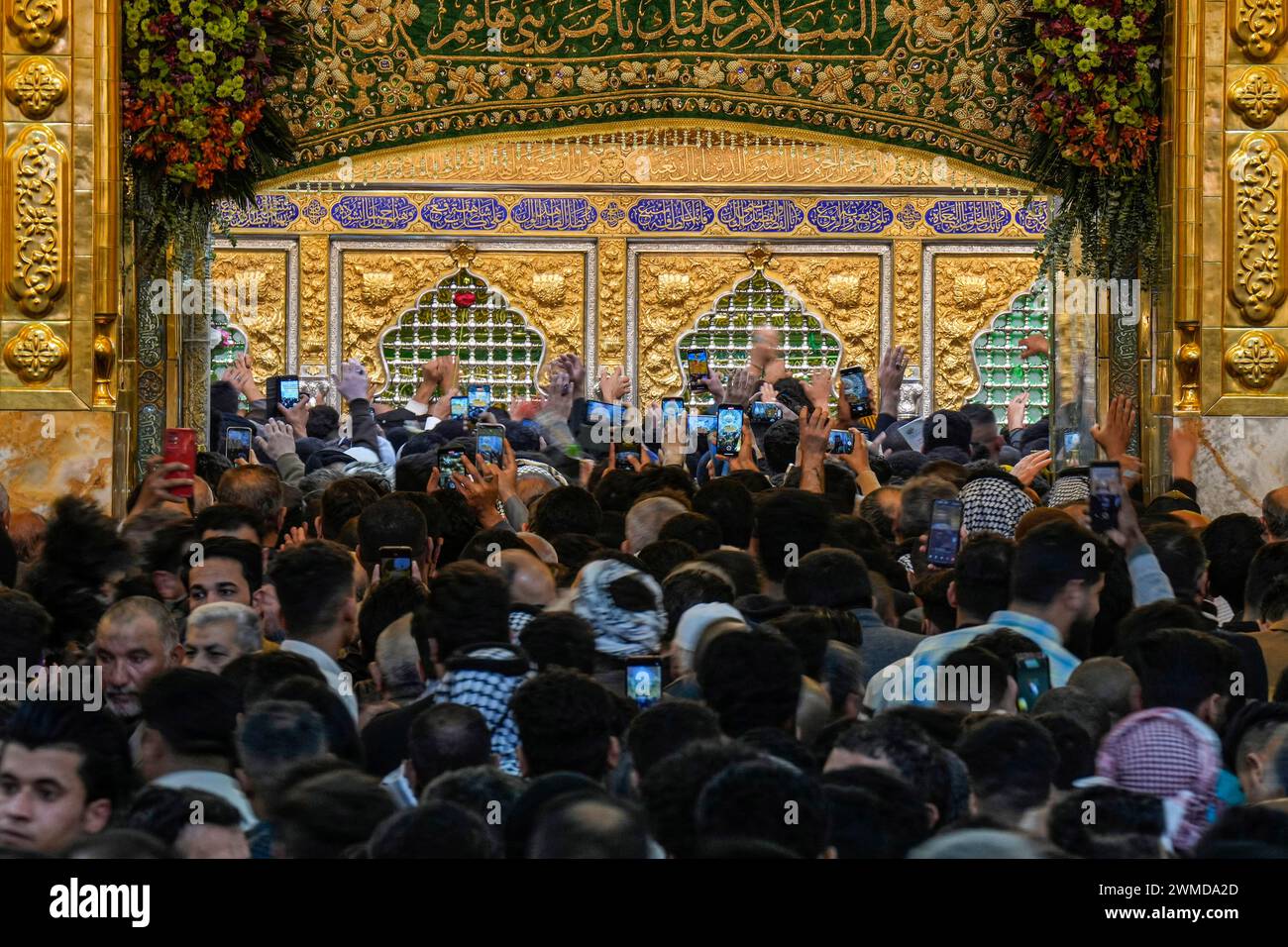 Shiite Muslim worshipers gather at the holy shrine of Imam Abbas during ...