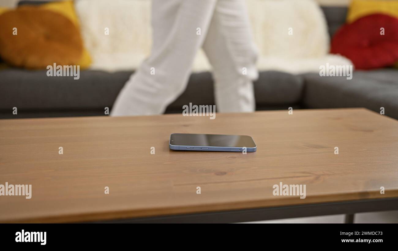 Anxious young hispanic man eagerly waiting for a crucial phone call ...