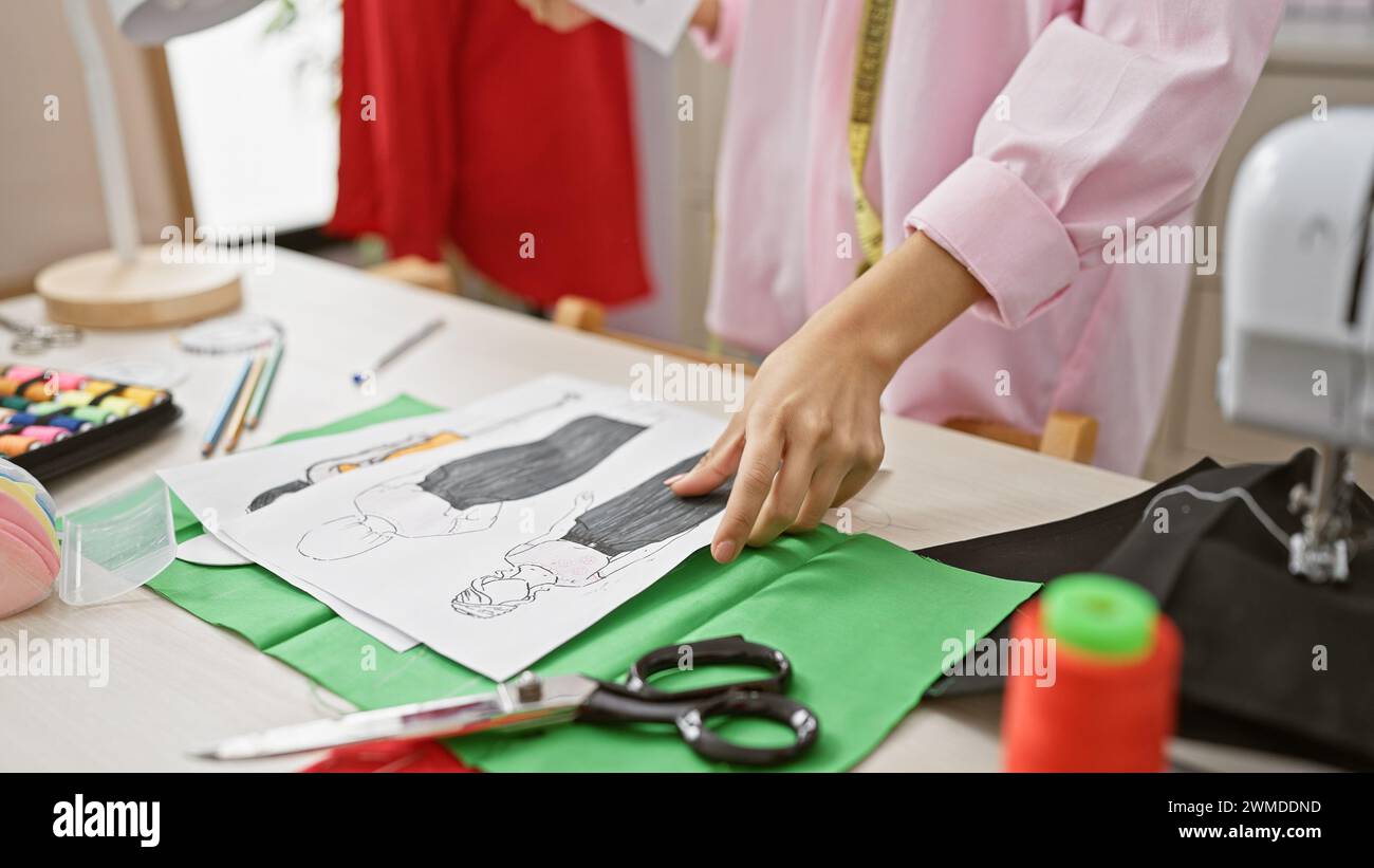 Hands working dressmaking scissors hi-res stock photography and images ...