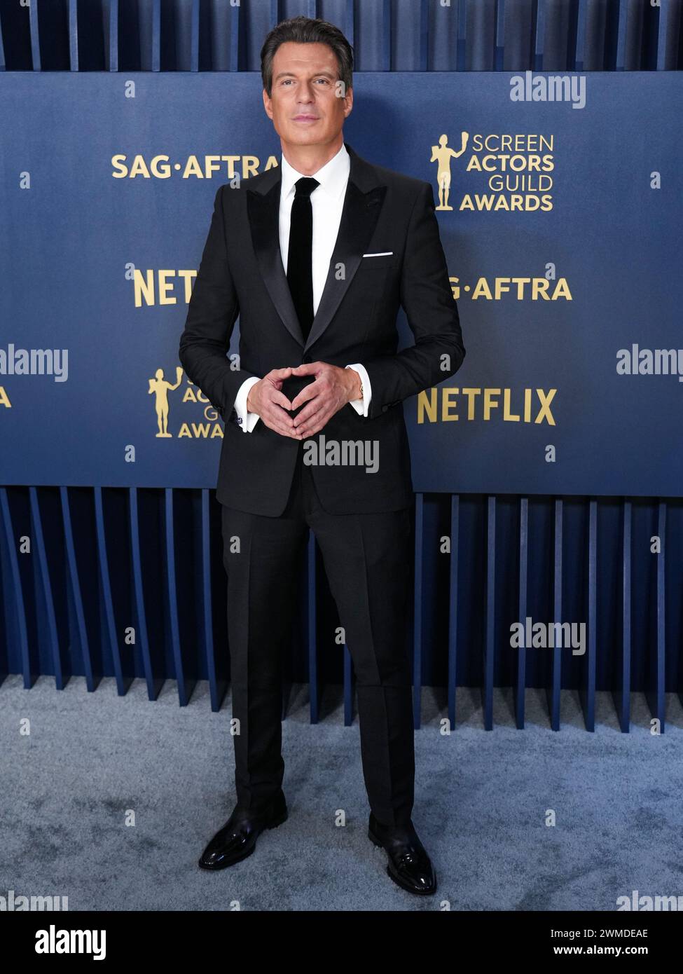 Los Angeles, USA. 24th Feb, 2024. Adam Glassman walking on the red ...