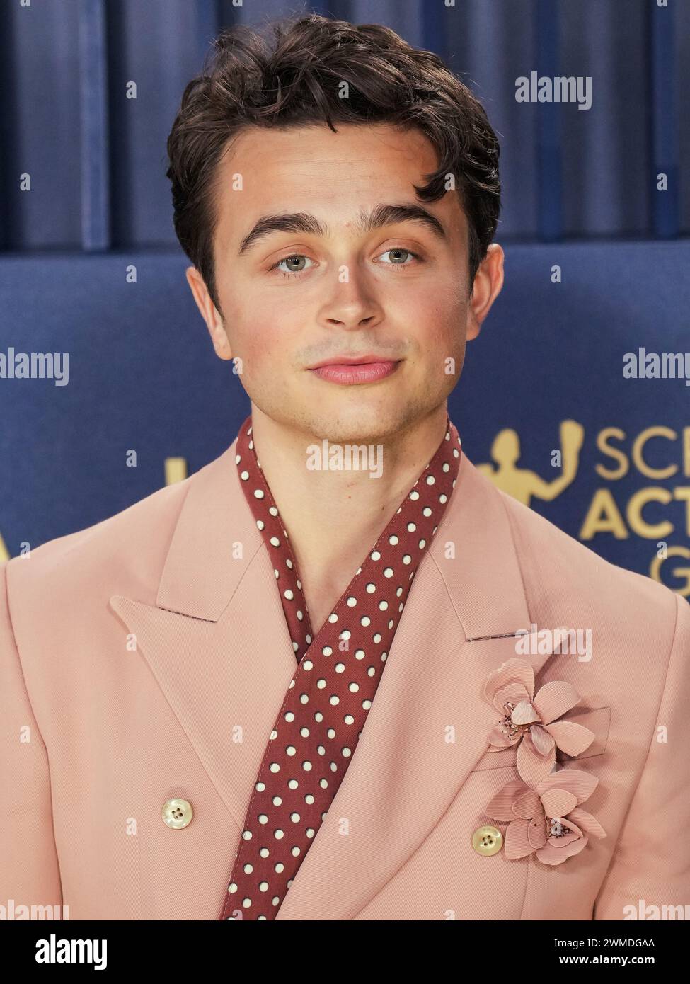 Los Angeles, USA. 24th Feb, 2024. Ben Ahlers walking on the red carpet ...