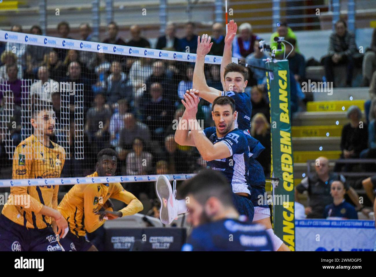 Latina, Italy. 25th Feb, 2024. Faure, Nedeljkovic block (Cisterna Volley) during Cisterna Volley ...
