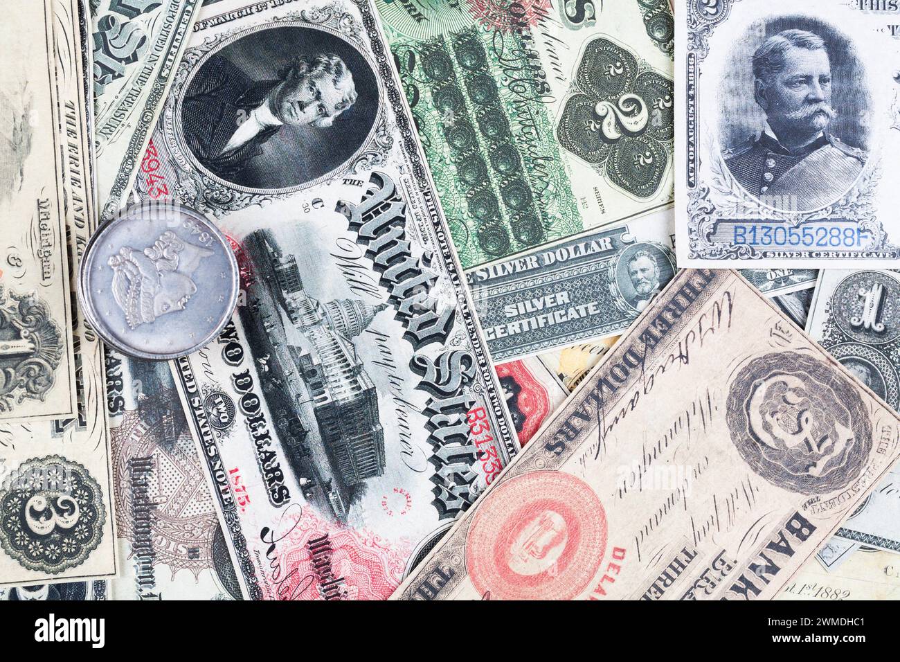 Old west period US banknotes and silver certificates with silver dollar ...