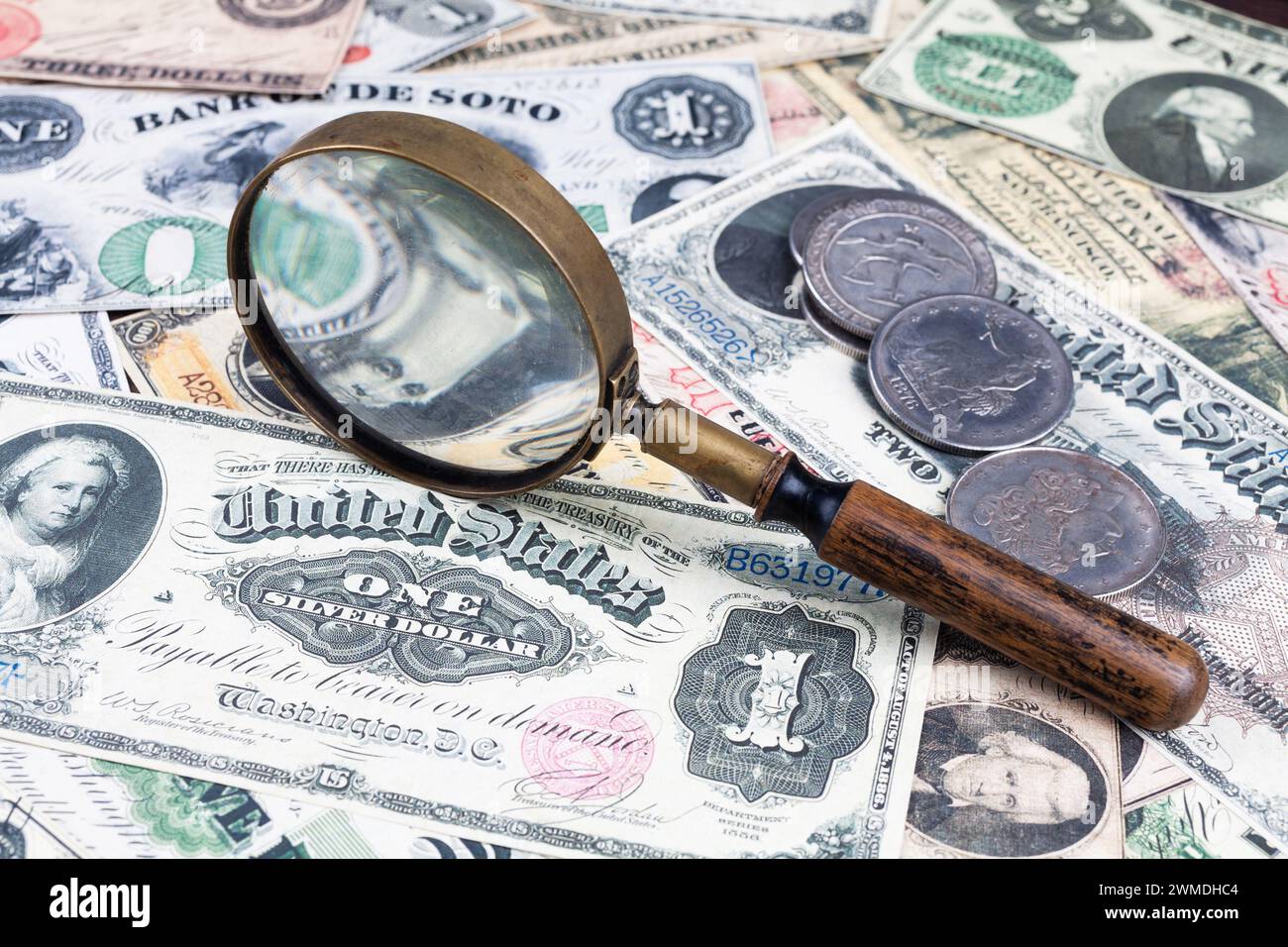 Old west period US banknotes and silver certificates with silver dollar ...