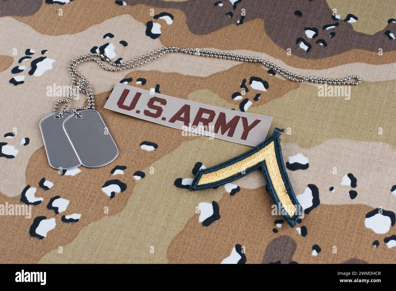 US ARMY private t rank patch and dog tags on Desert Battle Dress ...