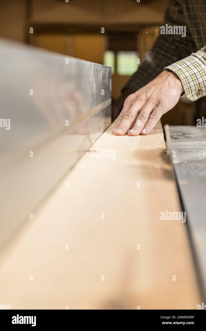 Vertical photo a master carpenter's hands demonstrate control and ...