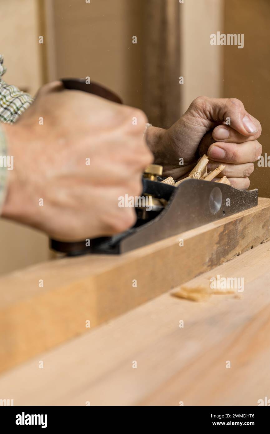 Vertical photo a close-up shot capturing the hands of a focused ...