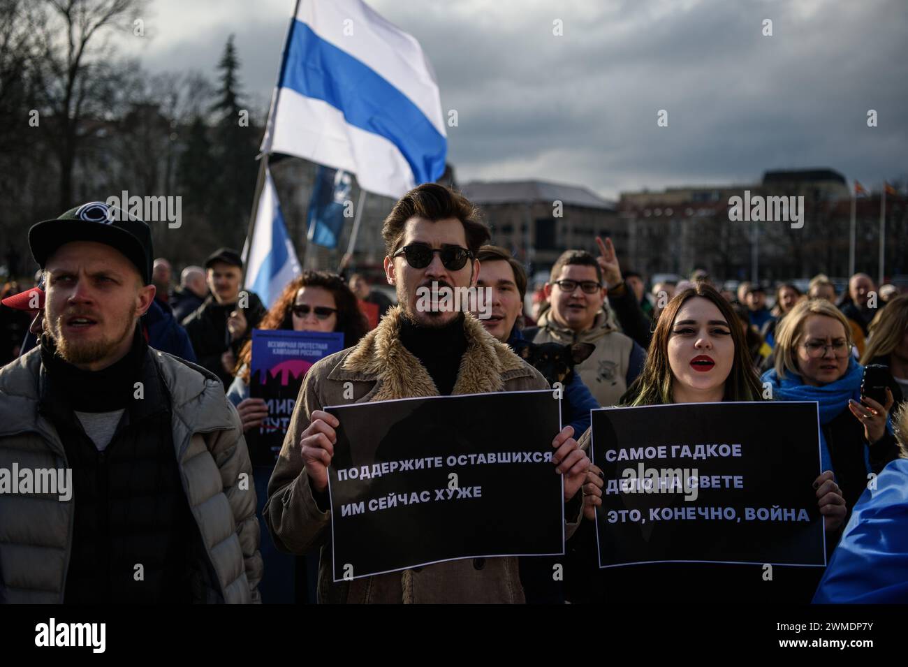Vilnius, Lithuania. 25th Feb, 2024. Protesters hold placards and chant ...