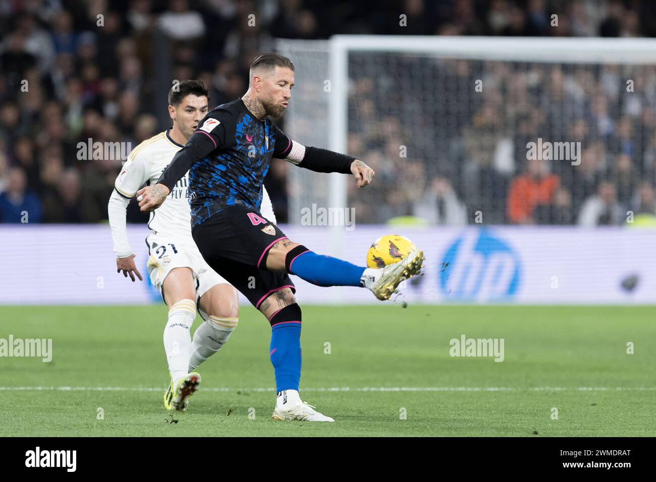 MADRID, SPAIN - FEBRUARY 25: Sergio Ramos of Sevilla controls the ball ...