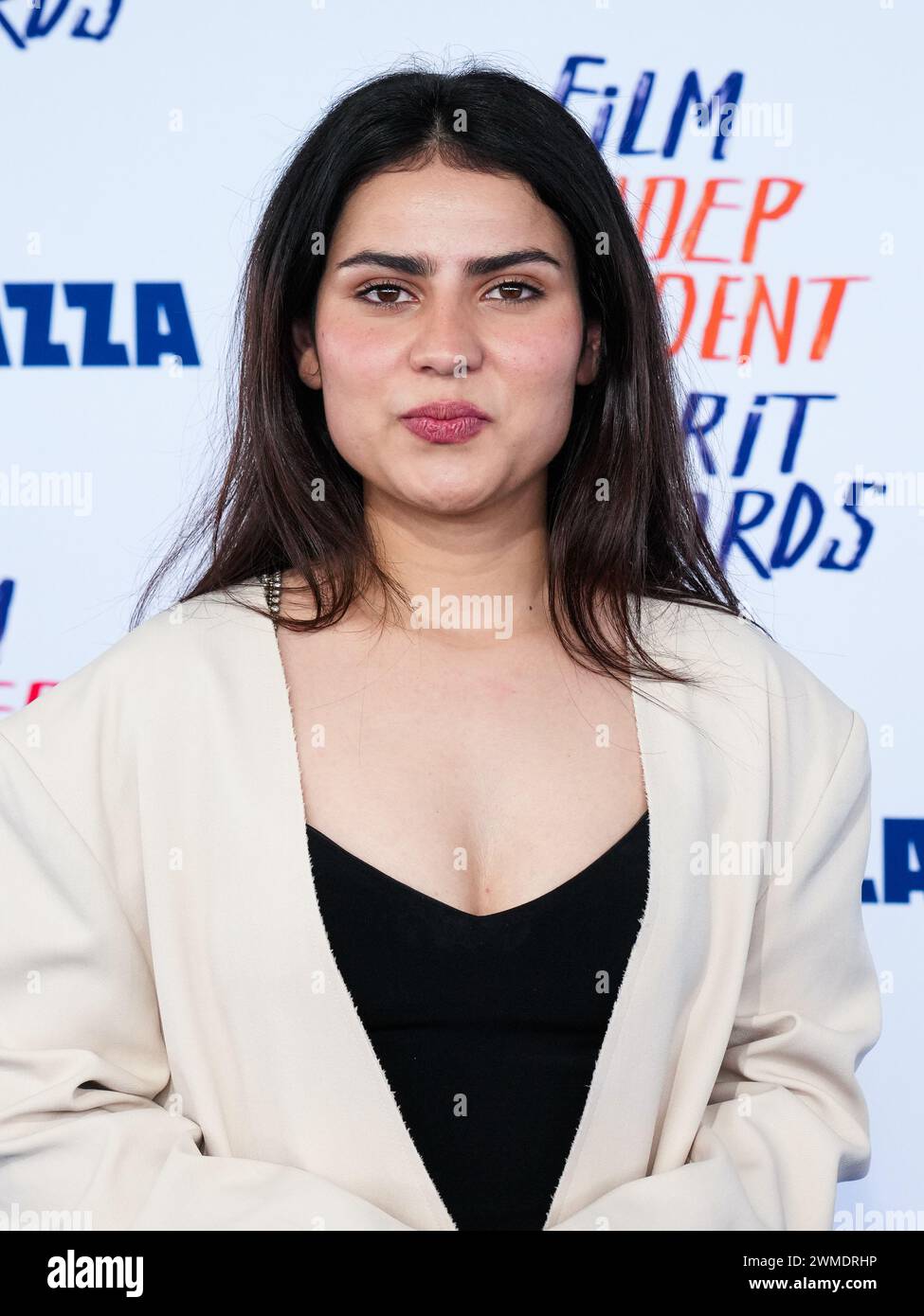 Los Angeles, USA. 25th Feb, 2024. Anaita Wali Zada walking on the red ...