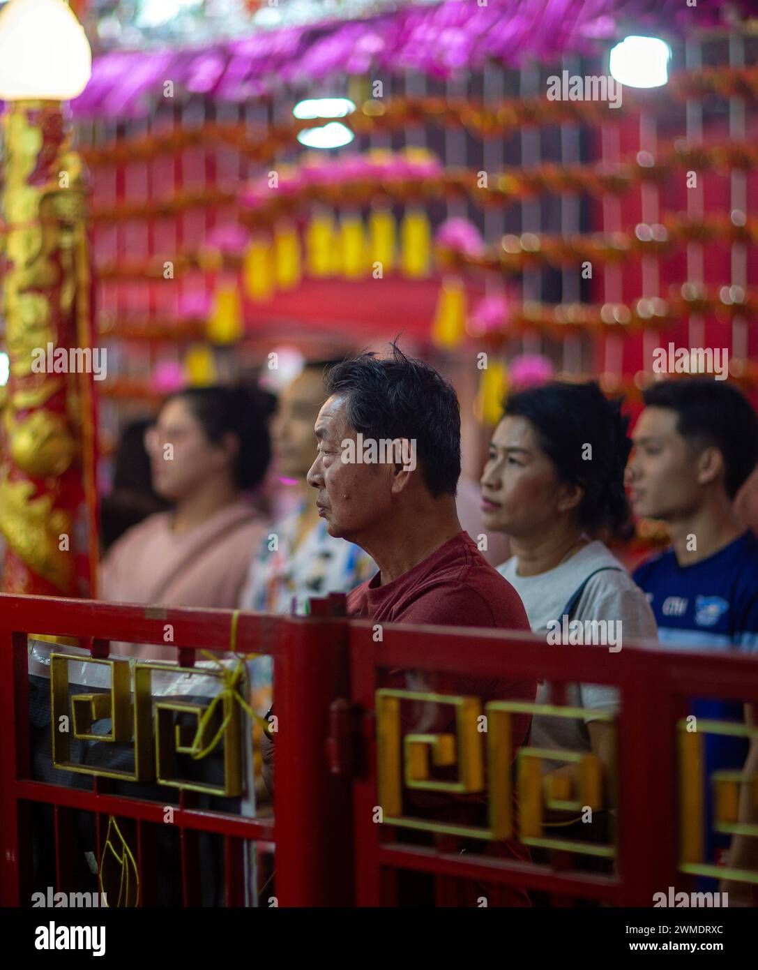 People watch Chinese opera performance during the birthday celebration ...