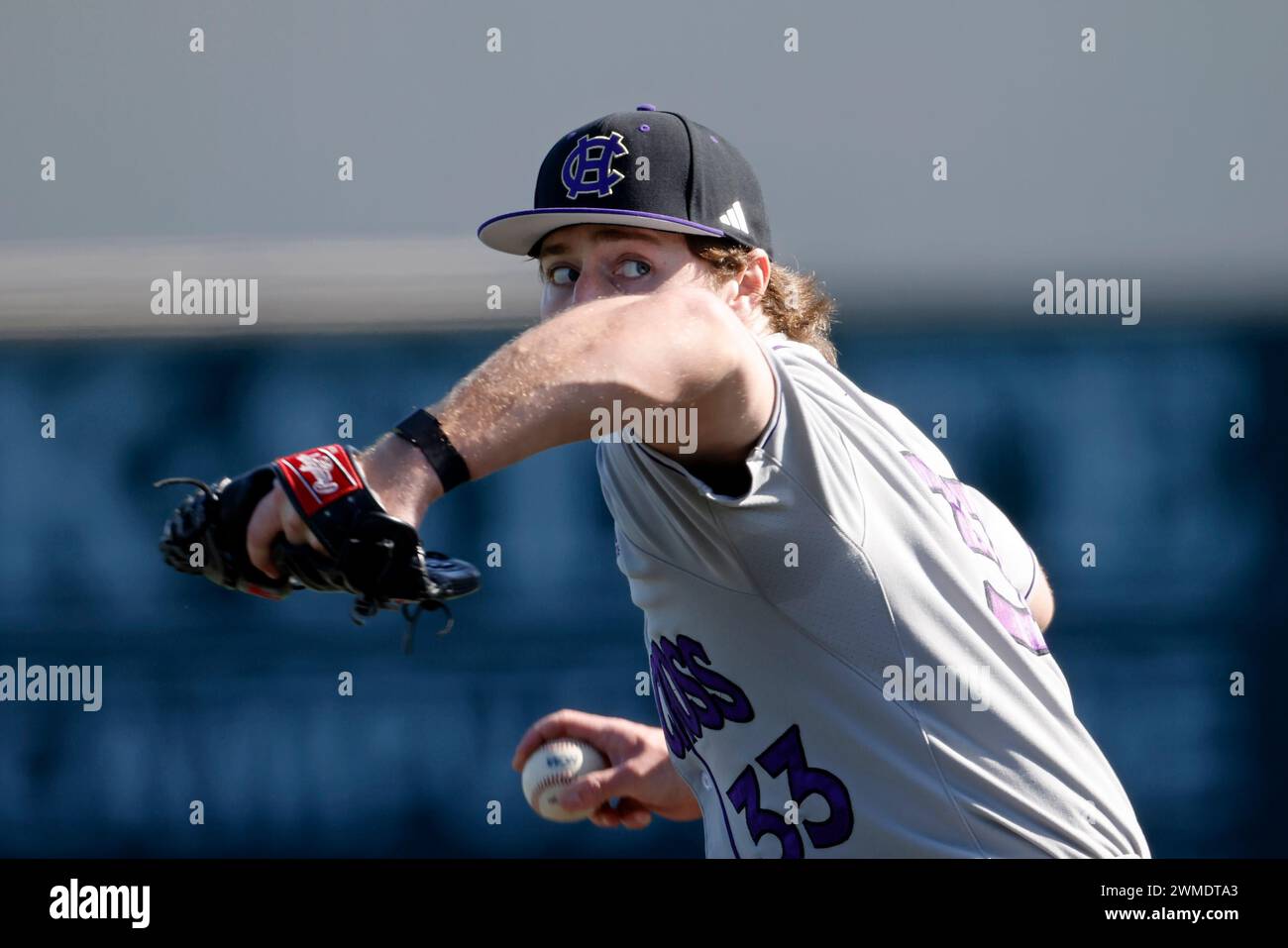 Holy Cross pitcher Sean Scanlon delivers to a Kansas State batter ...