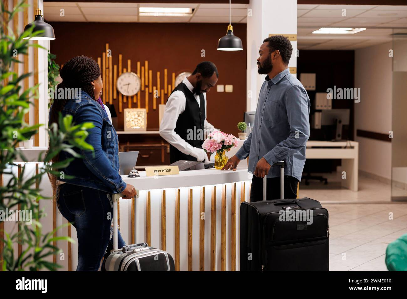 Couple resort check in hi-res stock photography and images - Alamy